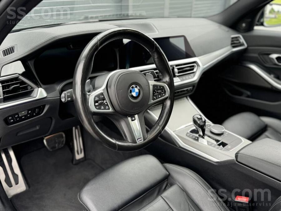 Black BMW 330 2021 in Riga, with an engine capacity of 2.00 L and mileage of 171 thousand km for 27500 €, photo 9 on AUTOMOTO.COM.LV