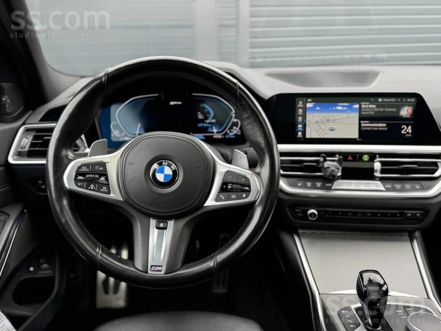 Black BMW 330 2021 in Riga, with an engine capacity of 2.00 L and mileage of 171 thousand km for 27500 €, photo 10 on AUTOMOTO.COM.LV