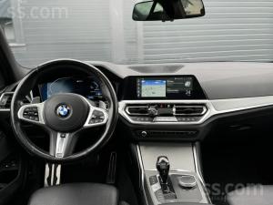 Black BMW 330 2021 in Riga, with an engine capacity of 2.00 L and mileage of 171 thousand km for 27500 €, photo 11 on AUTOMOTO.COM.LV
