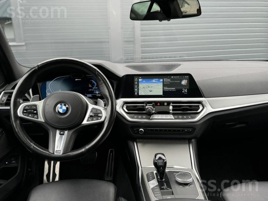 Black BMW 330 2021 in Riga, with an engine capacity of 2.00 L and mileage of 171 thousand km for 27500 €, photo 11 on AUTOMOTO.COM.LV