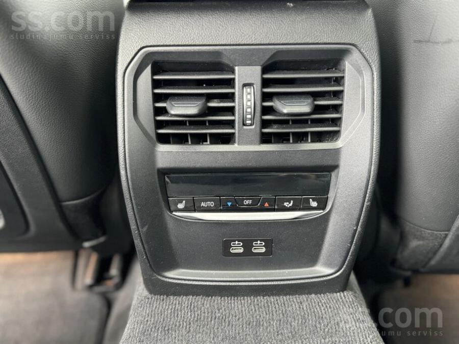 Black BMW 330 2021 in Riga, with an engine capacity of 2.00 L and mileage of 171 thousand km for 27500 €, photo 14 on AUTOMOTO.COM.LV
