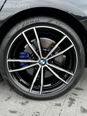 Black BMW 330 2021 in Riga, with an engine capacity of 2.00 L and mileage of 171 thousand km for 27500 €, photo 16 on AUTOMOTO.COM.LV