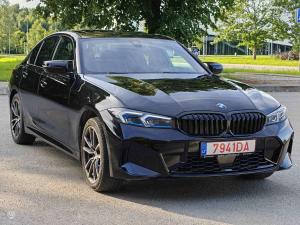 Black BMW 330 2021 in Plunge, with an engine capacity of 2.00 L and mileage of 95 thousand km for 24000 €, photo 3 on AUTOMOTO.COM.LV