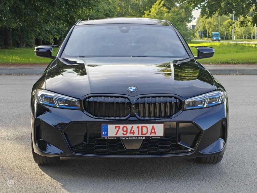 Black BMW 330 2021 in Plunge, with an engine capacity of 2.00 L and mileage of 95 thousand km for 24000 €, photo 6 on AUTOMOTO.COM.LV
