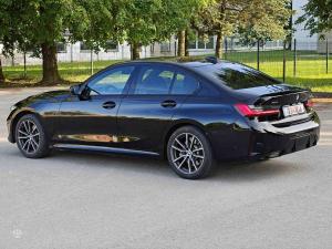 Black BMW 330 2021 in Plunge, with an engine capacity of 2.00 L and mileage of 95 thousand km for 24000 €, photo 7 on AUTOMOTO.COM.LV