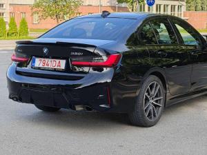 Black BMW 330 2021 in Plunge, with an engine capacity of 2.00 L and mileage of 95 thousand km for 24000 €, photo 9 on AUTOMOTO.COM.LV