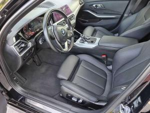 Black BMW 330 2021 in Plunge, with an engine capacity of 2.00 L and mileage of 95 thousand km for 24000 €, photo 13 on AUTOMOTO.COM.LV