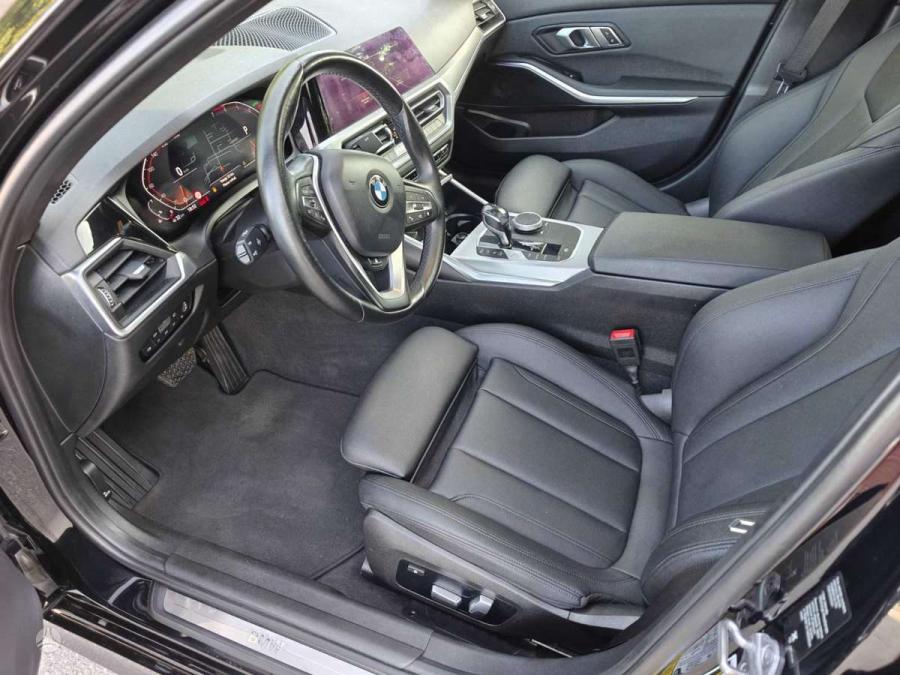 Black BMW 330 2021 in Plunge, with an engine capacity of 2.00 L and mileage of 95 thousand km for 24000 €, photo 13 on AUTOMOTO.COM.LV