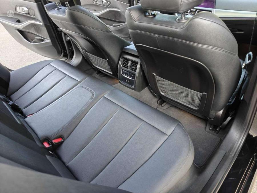 Black BMW 330 2021 in Plunge, with an engine capacity of 2.00 L and mileage of 95 thousand km for 24000 €, photo 15 on AUTOMOTO.COM.LV
