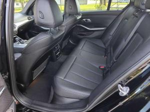 Black BMW 330 2021 in Plunge, with an engine capacity of 2.00 L and mileage of 95 thousand km for 24000 €, photo 16 on AUTOMOTO.COM.LV