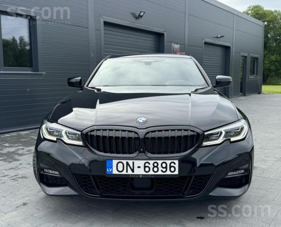 Black BMW 330 2021 in Riga, with an engine capacity of 2.00 L and mileage of 173 thousand km for 26990 €, photo 3 on AUTOMOTO.COM.LV