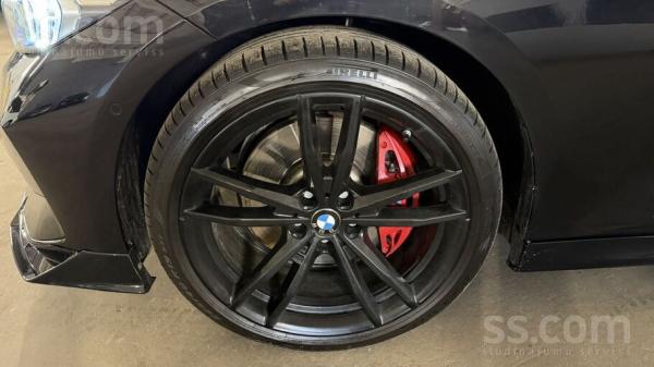 Black BMW 330 2021 in Riga, with an engine capacity of 3.00 L and mileage of 51 thousand km for 34900 €, photo 4 on AUTOMOTO.COM.LV