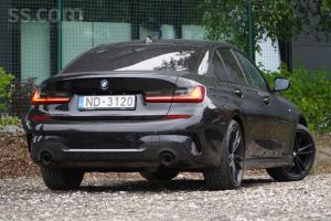 Black BMW 330 2022 in Riga, with an engine capacity of 2.00 L and mileage of 70 thousand km for 37990 €, photo 8 on AUTOMOTO.COM.LV