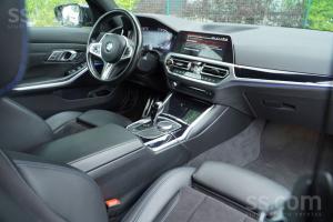 Black BMW 330 2022 in Riga, with an engine capacity of 2.00 L and mileage of 70 thousand km for 37990 €, photo 14 on AUTOMOTO.COM.LV