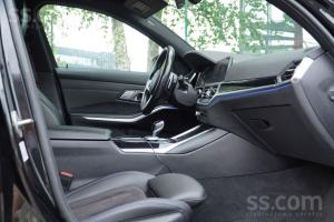 Black BMW 330 2022 in Riga, with an engine capacity of 2.00 L and mileage of 70 thousand km for 37990 €, photo 15 on AUTOMOTO.COM.LV