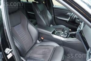 Black BMW 330 2022 in Riga, with an engine capacity of 2.00 L and mileage of 70 thousand km for 37990 €, photo 16 on AUTOMOTO.COM.LV