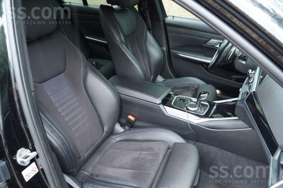 Black BMW 330 2022 in Riga, with an engine capacity of 2.00 L and mileage of 70 thousand km for 37990 €, photo 16 on AUTOMOTO.COM.LV