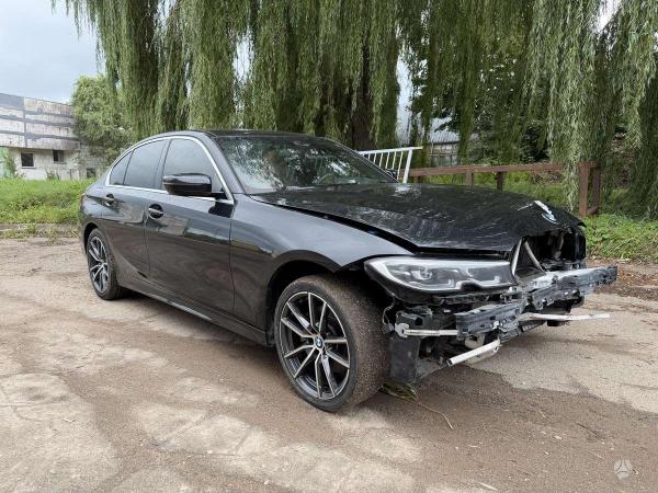 Black BMW 330 2022 in Siauliai, with an engine capacity of 2.00 L and mileage of 160 thousand km for 16200 €, photo 1 on AUTOMOTO.COM.LV