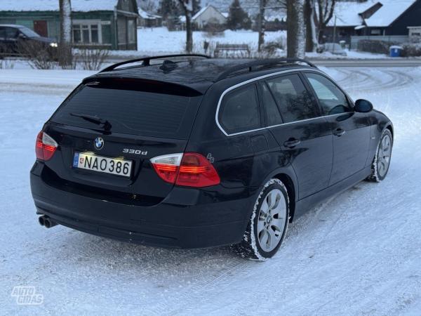 Black BMW 330 2006 in Ukmerge, with an engine capacity of 3.00 L and mileage of 335 thousand km for 3250 €, photo 5 on AUTOMOTO.COM.LV
