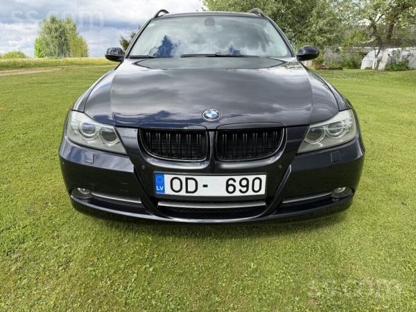 Black BMW 330 2008 in Riga, with an engine capacity of 3.00 L and mileage of 265 thousand km for 5700 €, photo 2 on AUTOMOTO.COM.LV