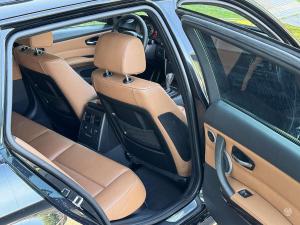 Black BMW 330 2008 in Siauliai, with an engine capacity of 2.99 L and mileage of 252 thousand km for 7490 €, photo 12 on AUTOMOTO.COM.LV