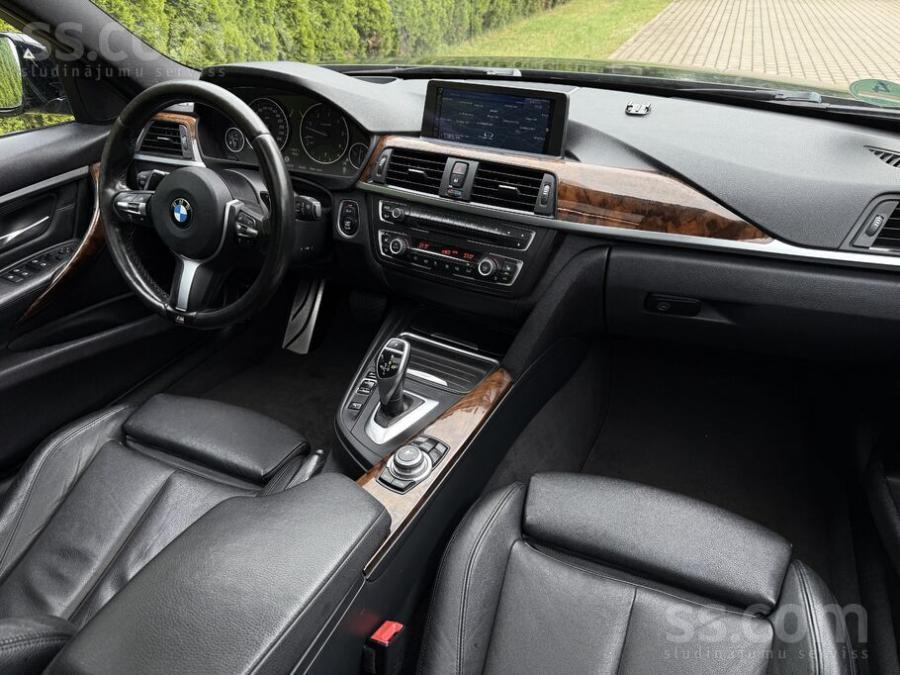 Black BMW 330 2012 in Riga, with an engine capacity of 3.00 L and mileage of 334 thousand km for 10990 €, photo 8 on AUTOMOTO.COM.LV