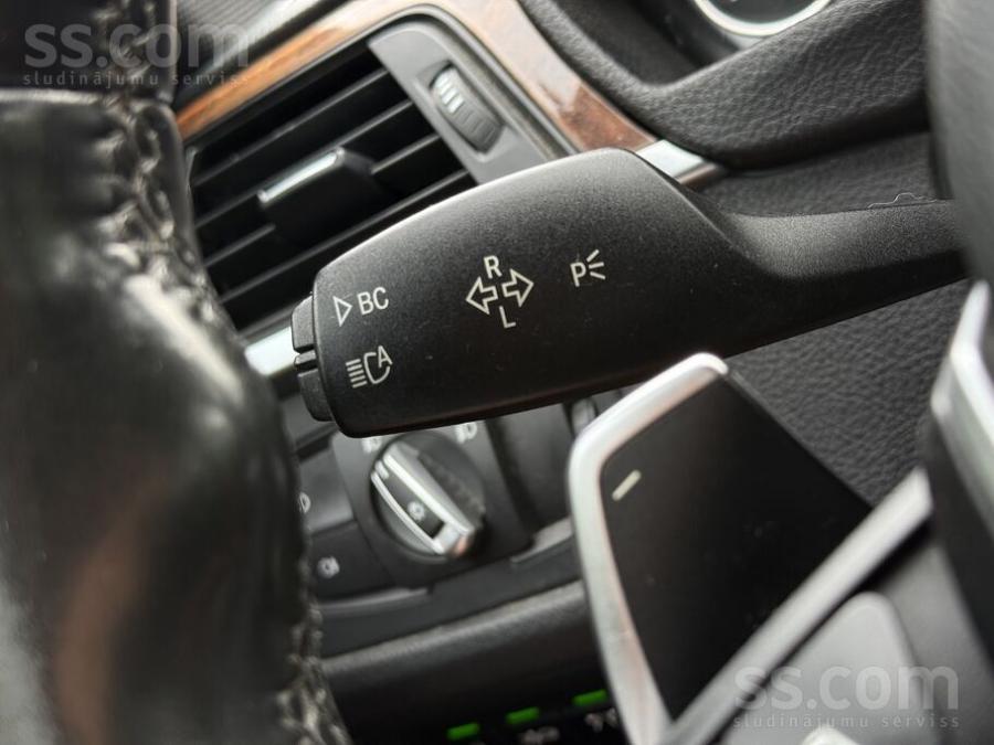 Black BMW 330 2012 in Riga, with an engine capacity of 3.00 L and mileage of 334 thousand km for 10990 €, photo 10 on AUTOMOTO.COM.LV