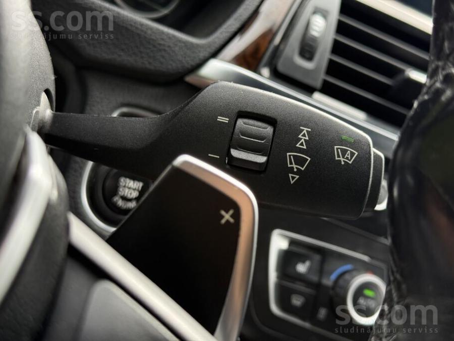 Black BMW 330 2012 in Riga, with an engine capacity of 3.00 L and mileage of 334 thousand km for 10990 €, photo 11 on AUTOMOTO.COM.LV