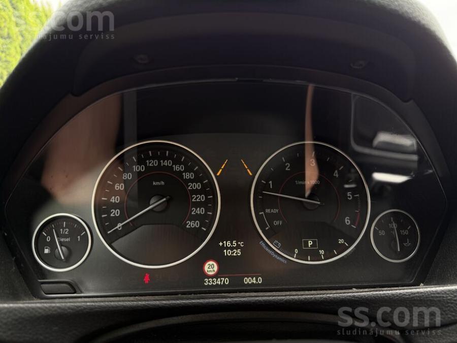 Black BMW 330 2012 in Riga, with an engine capacity of 3.00 L and mileage of 334 thousand km for 10990 €, photo 12 on AUTOMOTO.COM.LV