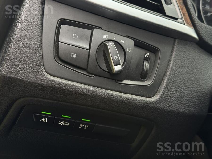 Black BMW 330 2012 in Riga, with an engine capacity of 3.00 L and mileage of 334 thousand km for 10990 €, photo 14 on AUTOMOTO.COM.LV