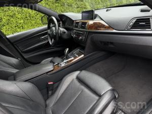 Black BMW 330 2012 in Riga, with an engine capacity of 3.00 L and mileage of 334 thousand km for 10990 €, photo 15 on AUTOMOTO.COM.LV