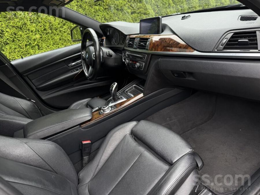 Black BMW 330 2012 in Riga, with an engine capacity of 3.00 L and mileage of 334 thousand km for 10990 €, photo 15 on AUTOMOTO.COM.LV