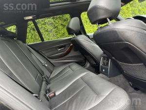 Black BMW 330 2012 in Riga, with an engine capacity of 3.00 L and mileage of 334 thousand km for 10990 €, photo 20 on AUTOMOTO.COM.LV