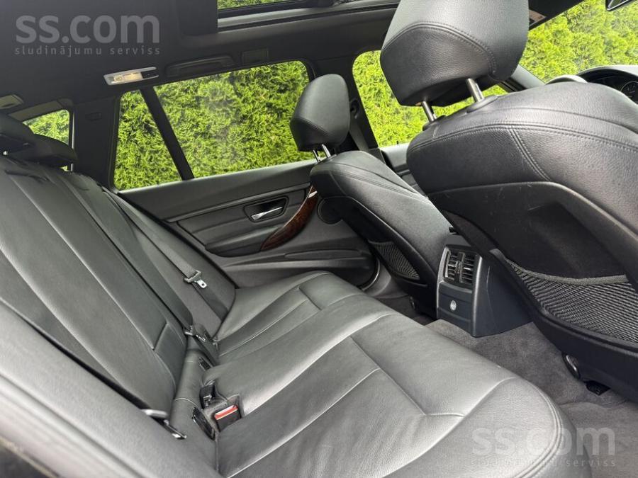 Black BMW 330 2012 in Riga, with an engine capacity of 3.00 L and mileage of 334 thousand km for 10990 €, photo 20 on AUTOMOTO.COM.LV