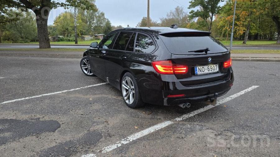 Black BMW 330 2012 in Riga, with an engine capacity of 3.00 L and mileage of 292 thousand km for 8800 €, photo 1 on AUTOMOTO.COM.LV