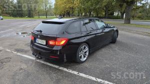 Black BMW 330 2012 in Riga, with an engine capacity of 3.00 L and mileage of 292 thousand km for 8800 €, photo 3 on AUTOMOTO.COM.LV