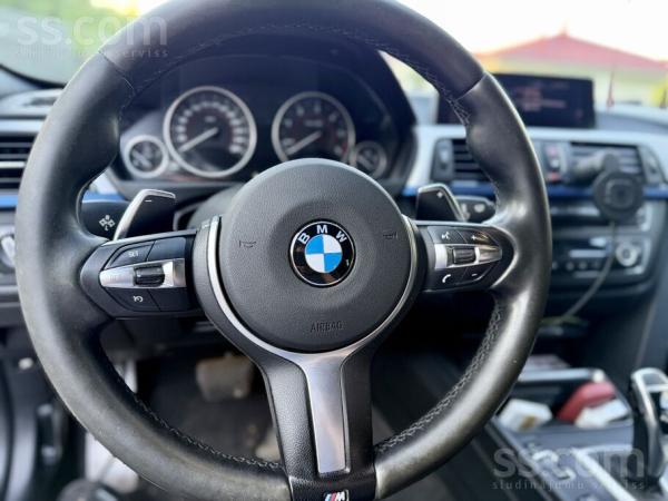 Black BMW 330 2012 in Riga, with an engine capacity of 3.00 L and mileage of 317 thousand km for 10900 €, photo 9 on AUTOMOTO.COM.LV