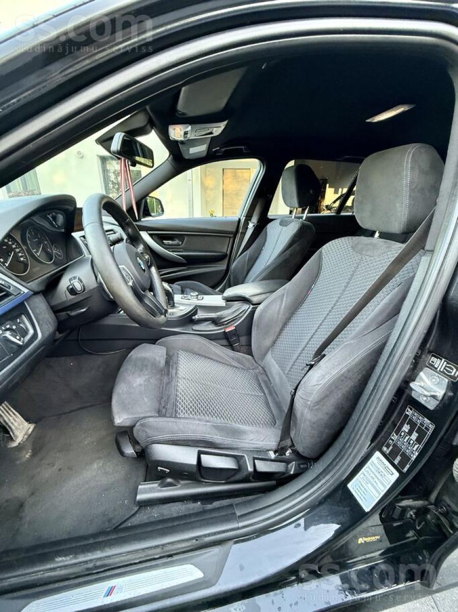 Black BMW 330 2012 in Riga, with an engine capacity of 3.00 L and mileage of 317 thousand km for 10900 €, photo 9 on AUTOMOTO.COM.LV