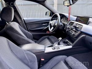 Black BMW 330 2012 in Riga, with an engine capacity of 3.00 L and mileage of 317 thousand km for 10900 €, photo 15 on AUTOMOTO.COM.LV