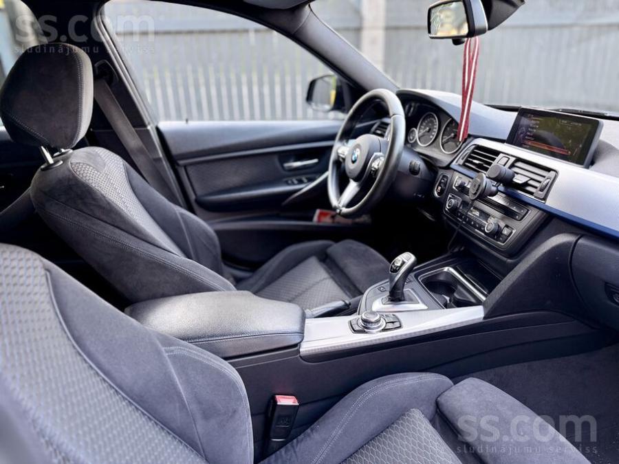 Black BMW 330 2012 in Riga, with an engine capacity of 3.00 L and mileage of 317 thousand km for 10900 €, photo 15 on AUTOMOTO.COM.LV
