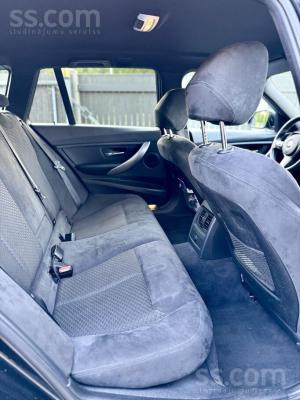 Black BMW 330 2012 in Riga, with an engine capacity of 3.00 L and mileage of 317 thousand km for 10900 €, photo 16 on AUTOMOTO.COM.LV