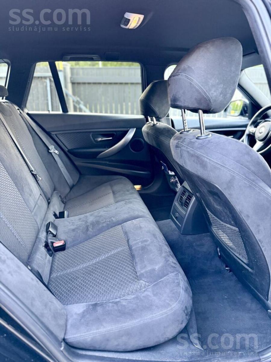 Black BMW 330 2012 in Riga, with an engine capacity of 3.00 L and mileage of 317 thousand km for 10900 €, photo 16 on AUTOMOTO.COM.LV