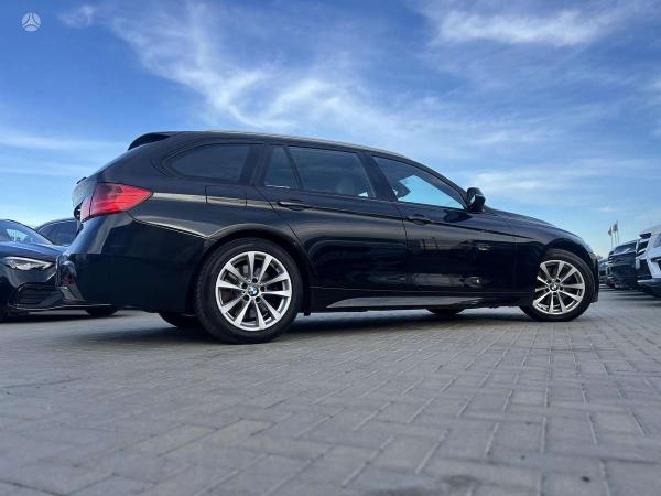 Black BMW 330 2012 in Kaunas, with an engine capacity of 2.99 L and mileage of 288 thousand km for 11999 €, photo 8 on AUTOMOTO.COM.LV