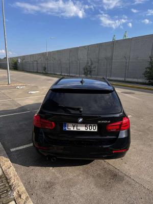 Black BMW 330 2013 in Klaipeda, with an engine capacity of 2.99 L and mileage of 289 thousand km for 10900 €, photo 7 on AUTOMOTO.COM.LV