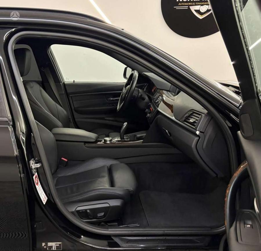 Black BMW 330 2013 in Marijampole, with an engine capacity of 2.99 L and mileage of 257 thousand km for 10999 €, photo 14 on AUTOMOTO.COM.LV
