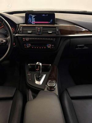 Black BMW 330 2013 in Marijampole, with an engine capacity of 2.99 L and mileage of 257 thousand km for 10999 €, photo 16 on AUTOMOTO.COM.LV