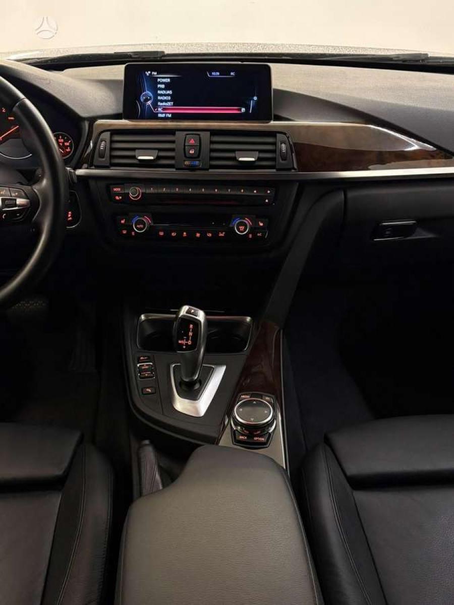Black BMW 330 2013 in Marijampole, with an engine capacity of 2.99 L and mileage of 257 thousand km for 10999 €, photo 16 on AUTOMOTO.COM.LV