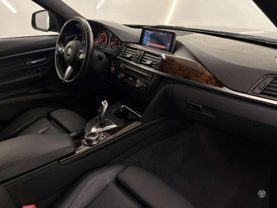 Black BMW 330 2013 in Marijampole, with an engine capacity of 2.99 L and mileage of 257 thousand km for 10999 €, photo 17 on AUTOMOTO.COM.LV