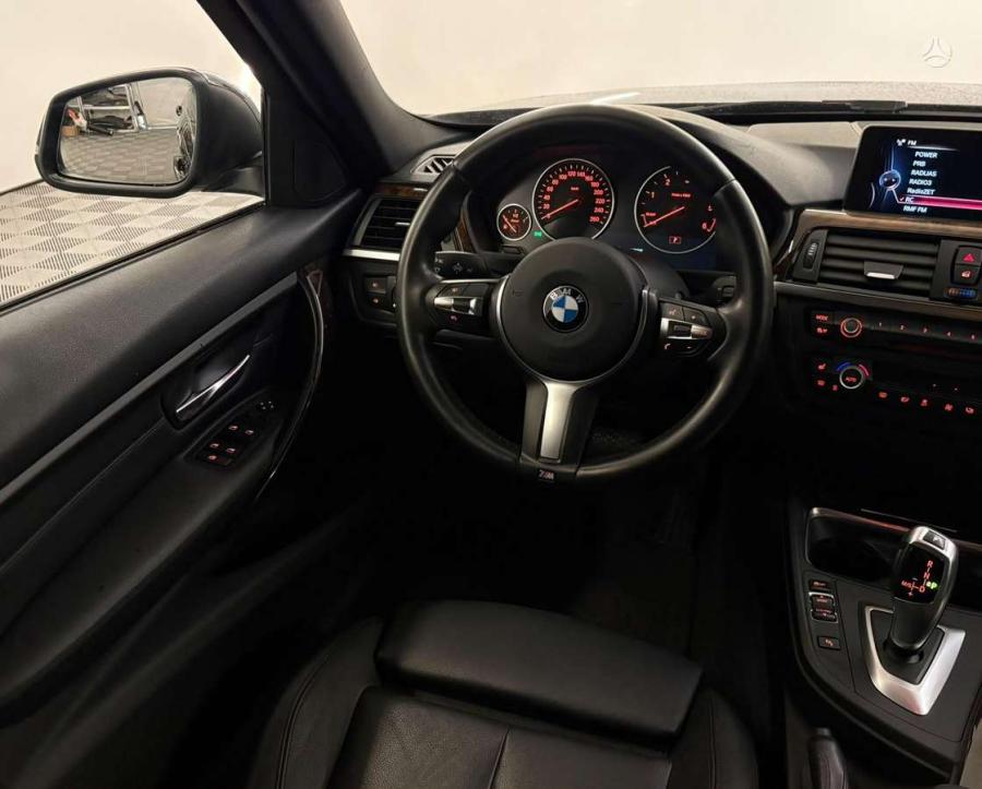 Black BMW 330 2013 in Marijampole, with an engine capacity of 2.99 L and mileage of 257 thousand km for 10999 €, photo 18 on AUTOMOTO.COM.LV