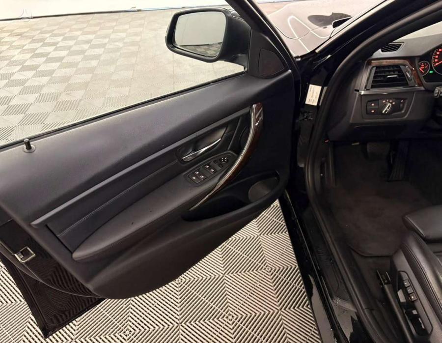 Black BMW 330 2013 in Marijampole, with an engine capacity of 2.99 L and mileage of 257 thousand km for 10999 €, photo 26 on AUTOMOTO.COM.LV